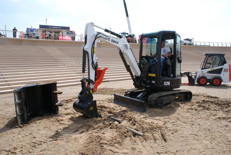 Bobcat attachments enjoy a day at the beach | Project Plant