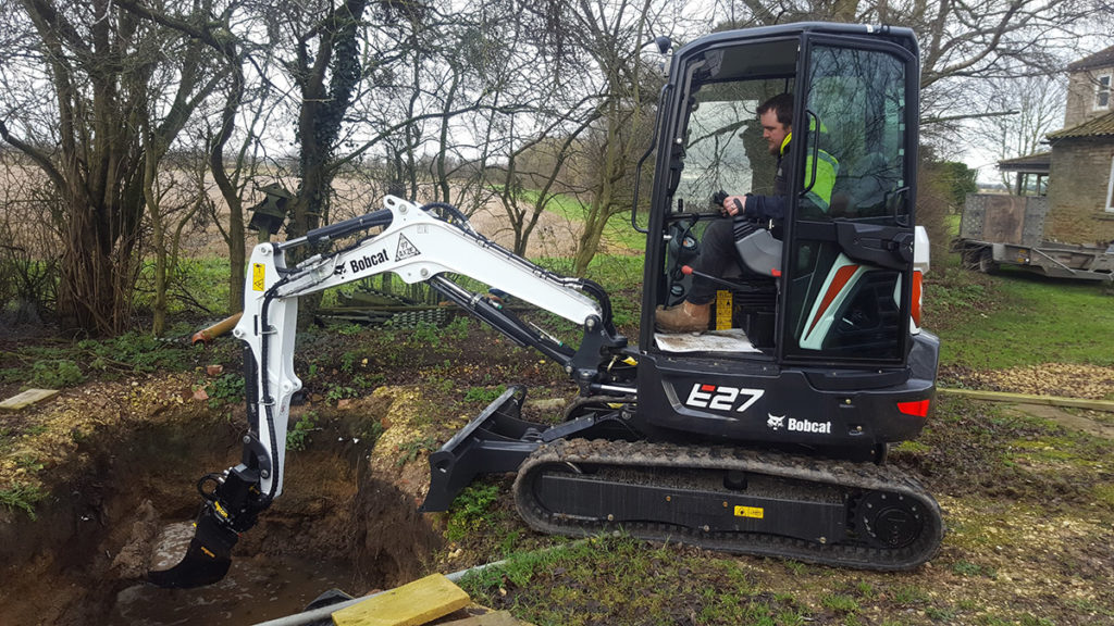 Mini excavator helps deliver eco-friendly homes | Project Plant